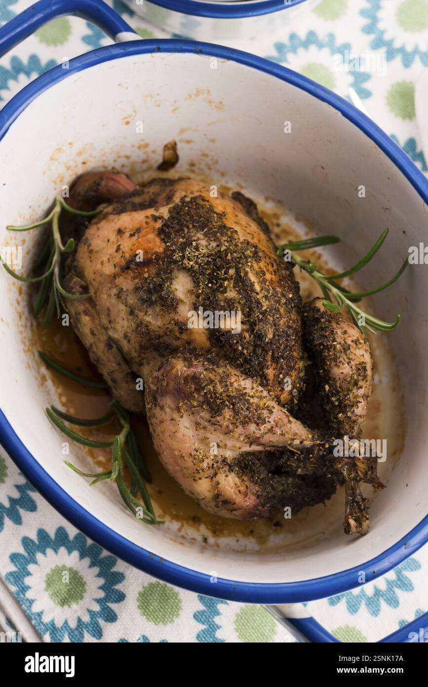 Roasted quail with herbs Stock Photo - Alamy