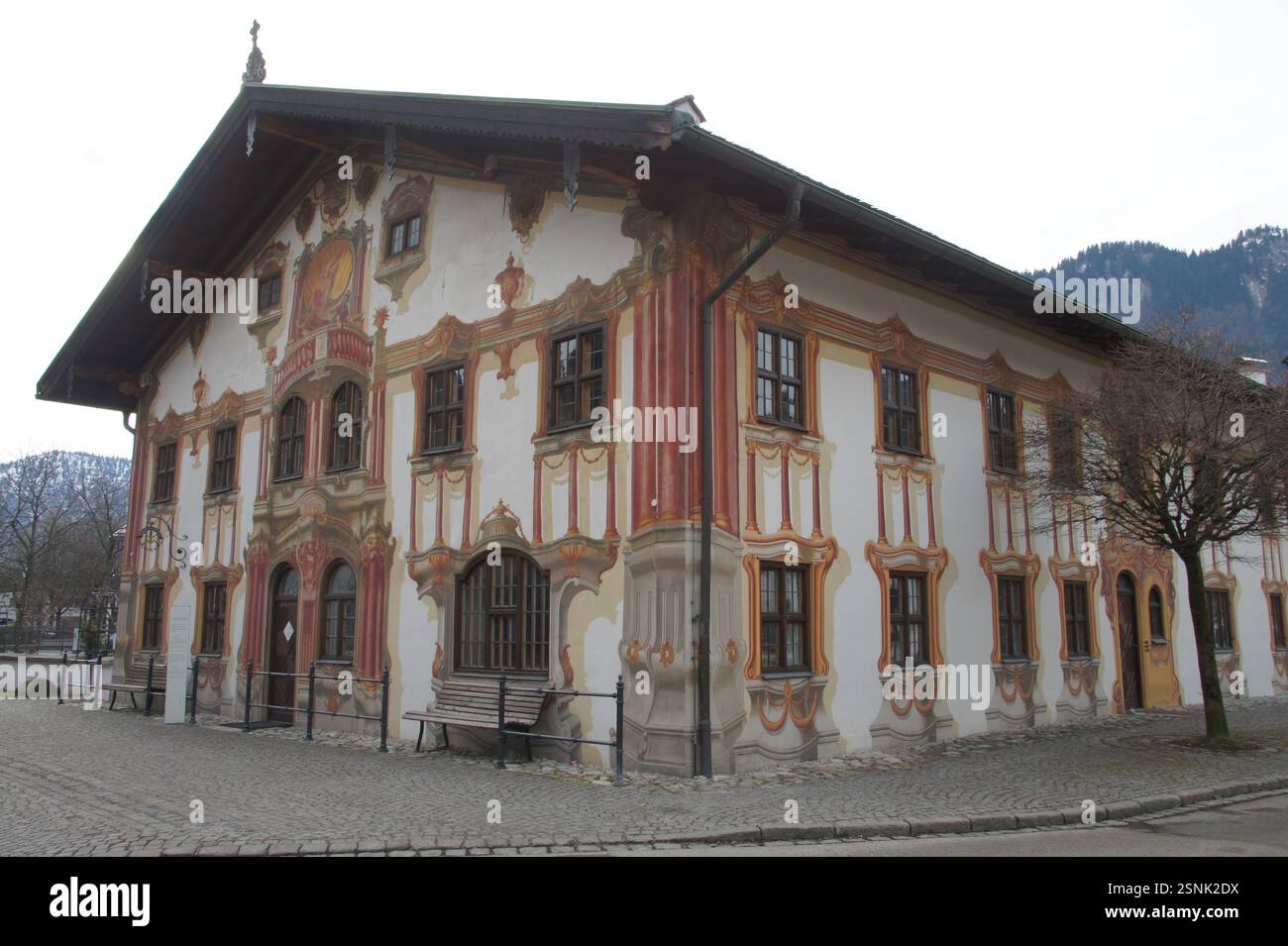 A brightly painted building with an ornate facade stands in Germany ...