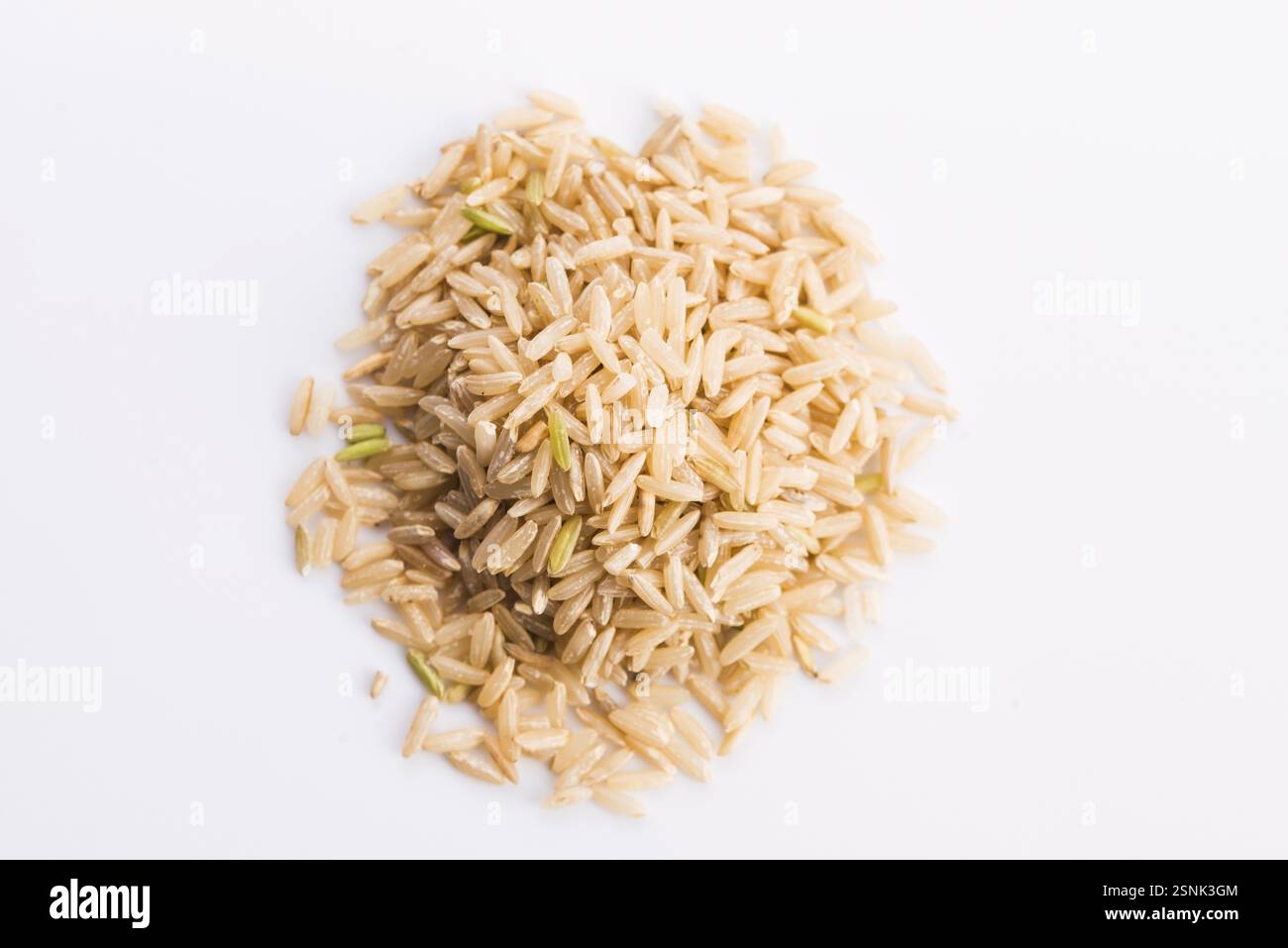 Whole rice pile on white background Stock Photo - Alamy