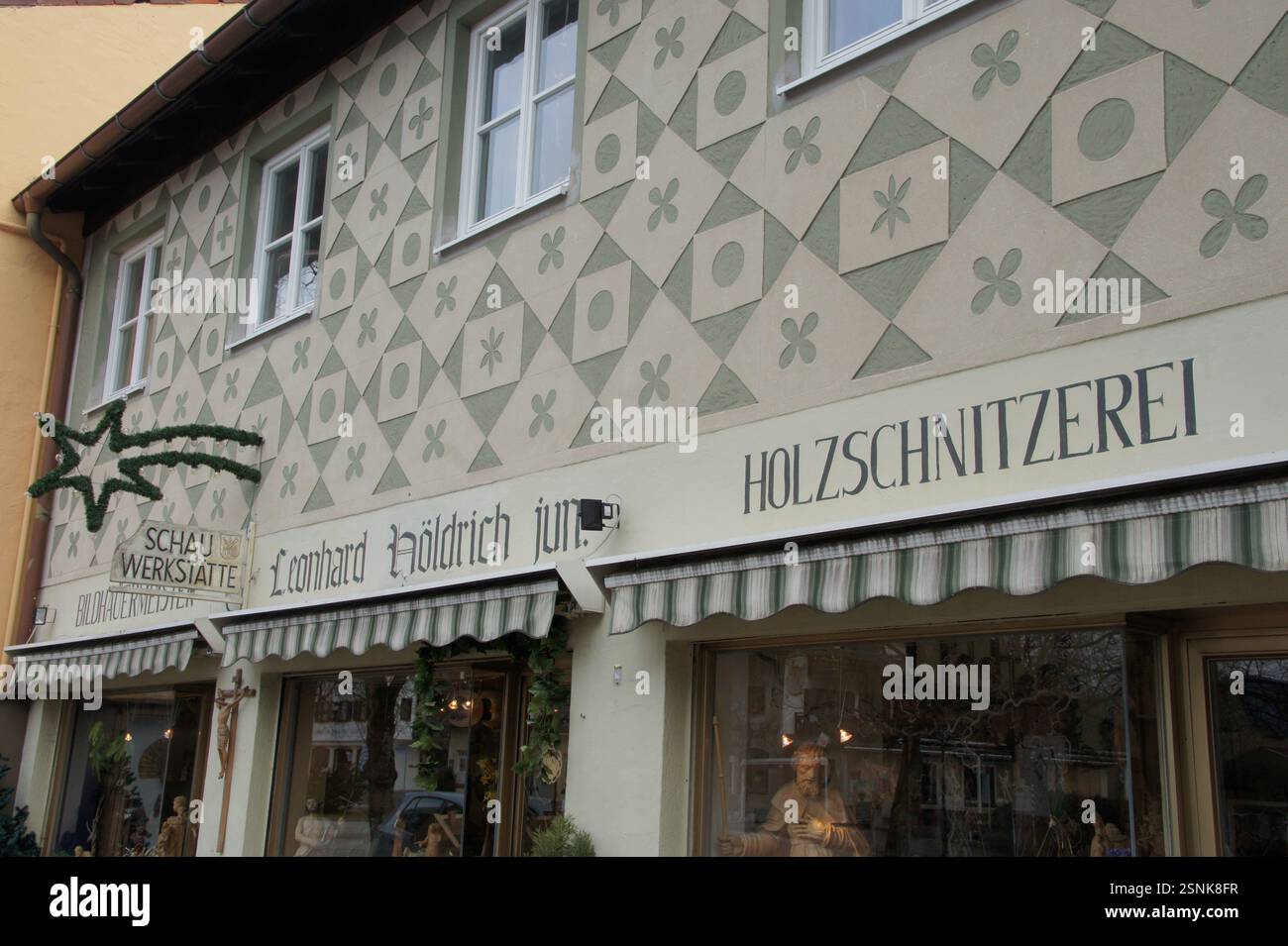 A possible German woodcarving shop in Munich, Germany. The building is ...