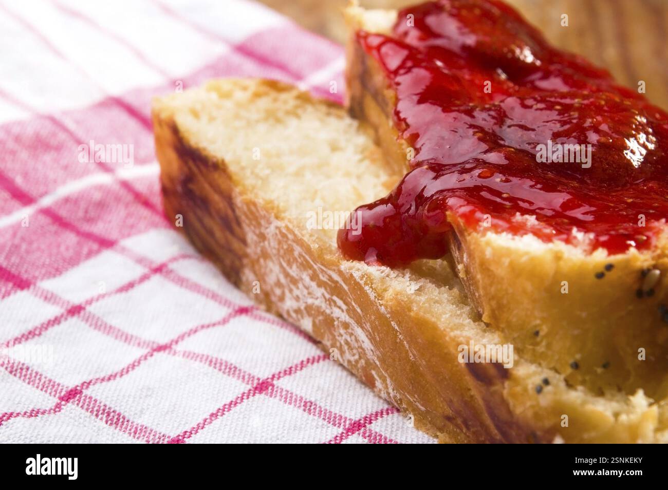 Sweet bread (challah) with strawberry jam, lodz, poland Stock Photo - Alamy