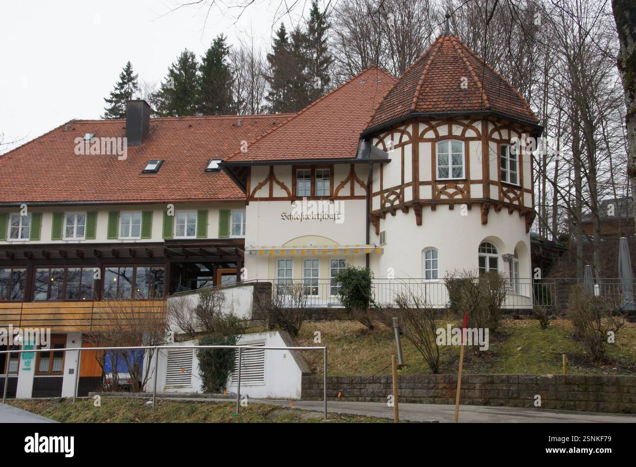Bavaria's Schlossrestaurant Neuschwanstein, a white building with a red ...