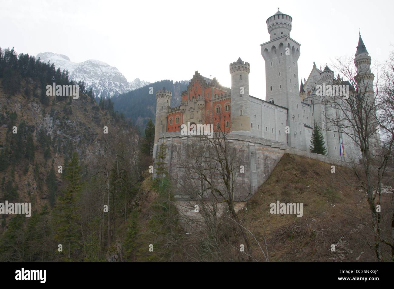 A fairytale castle, perched on a rugged hilltop in Germany, Munich, is ...