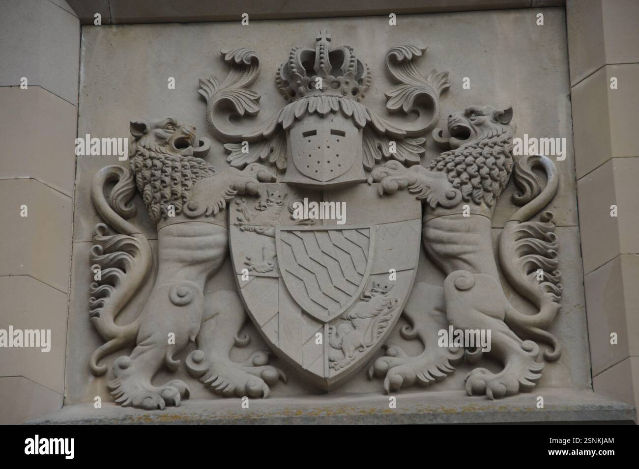 The stone carving of the coat of arms of Bavaria adorns a wall of ...