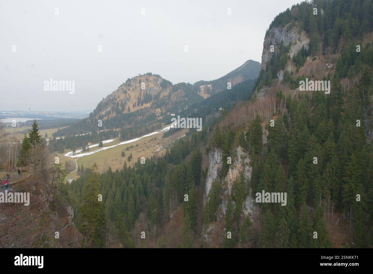 A breathtaking panorama unfolds in Germany, Munich. Lush green valleys ...
