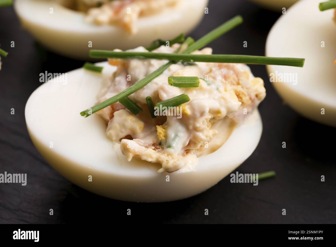 Stuffed eggs with salmon Stock Photo - Alamy