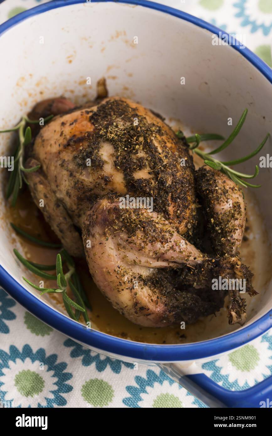 Roasted quail with herbs Stock Photo - Alamy