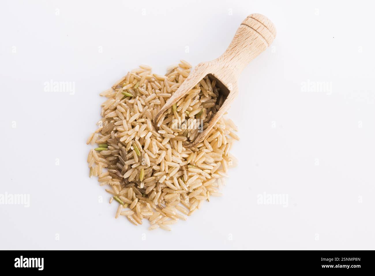Whole rice pile on white background Stock Photo - Alamy