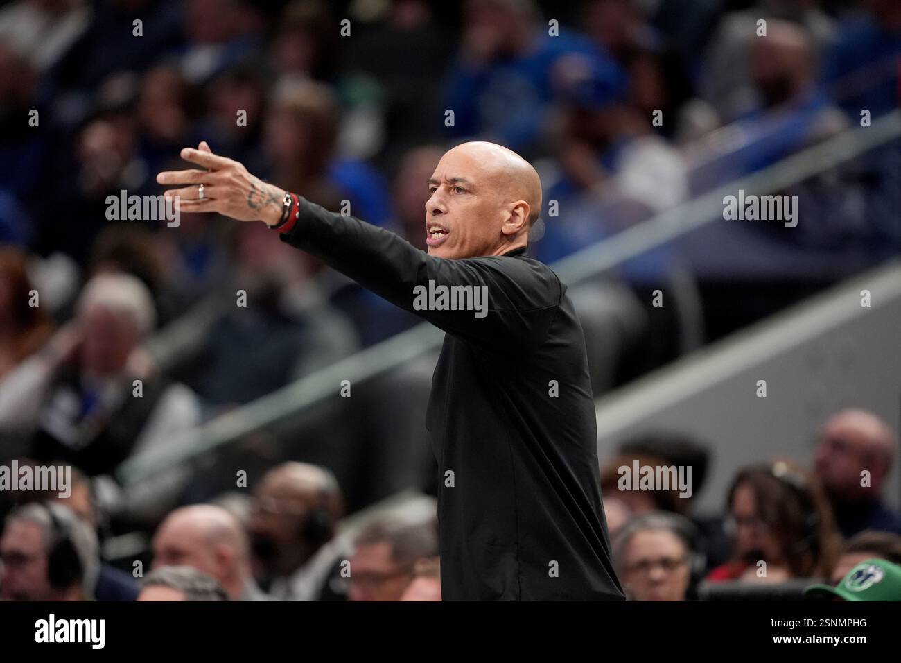 Sacramento Kings head coach Doug Christie instructs his team during an ...