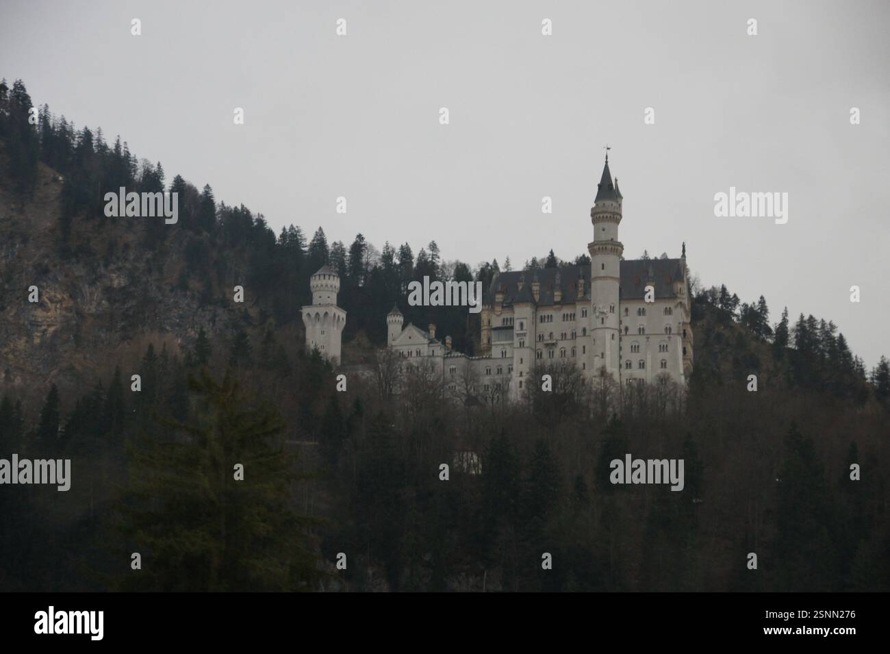 Neuschwanstein Castle, a Bavarian white castle with towers and turrets ...