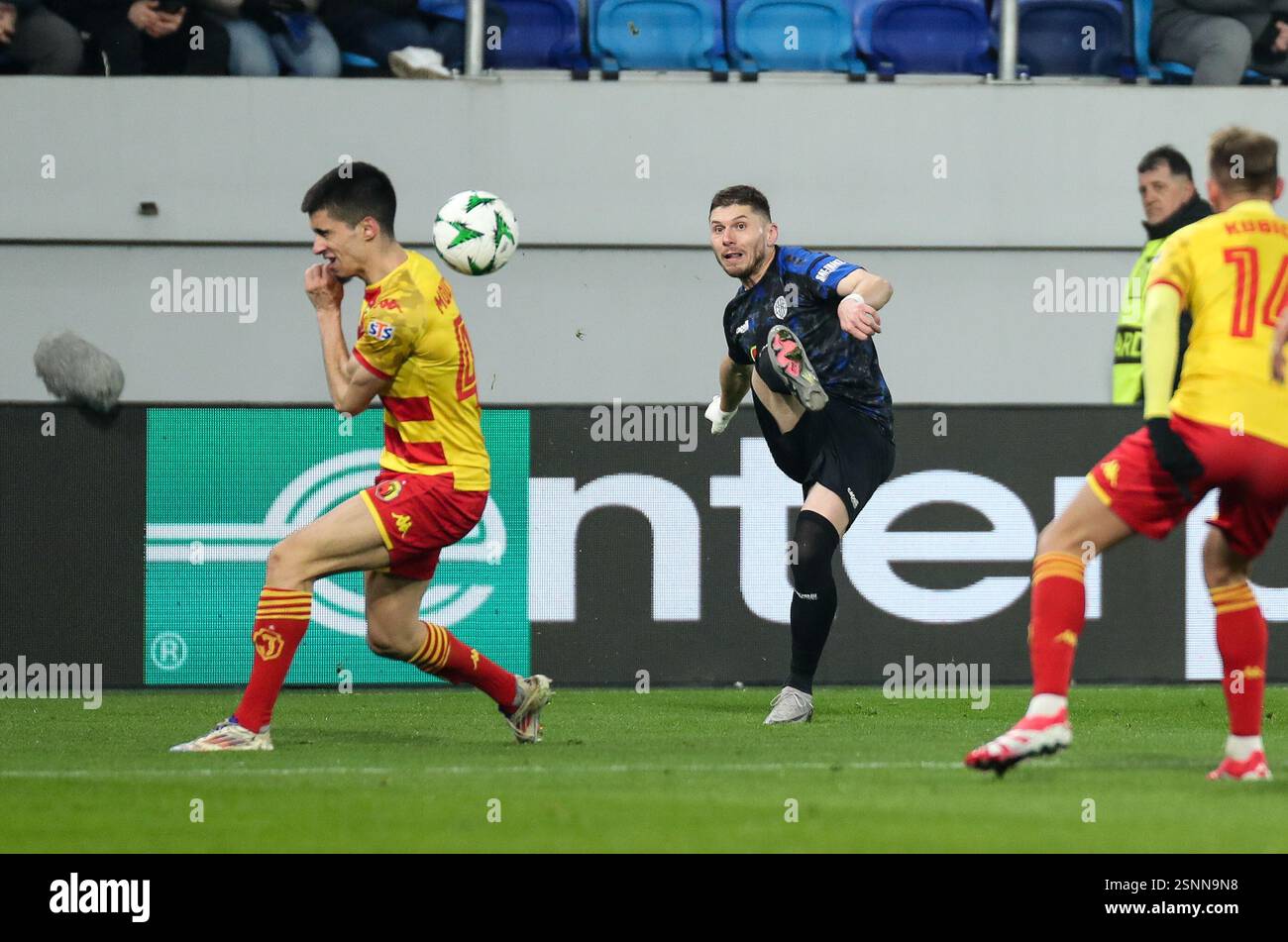 Backa Topola, Serbia. 13th Feb, 2025. Stefan Jovanovic of TSC (R) shoots during the UEFA ...