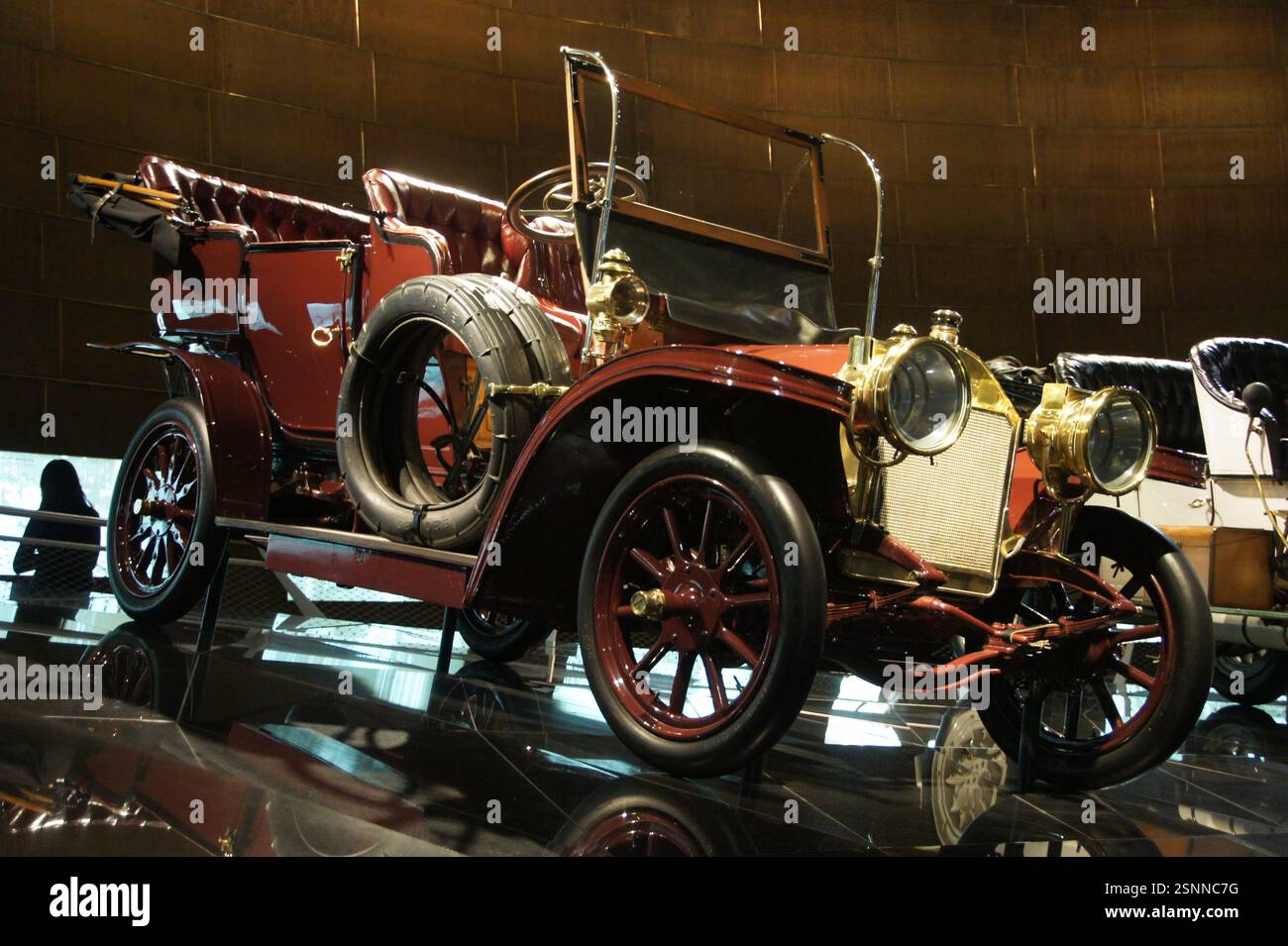 A vintage Mercedes-Benz 18 PS double phaeton car is on display in a ...