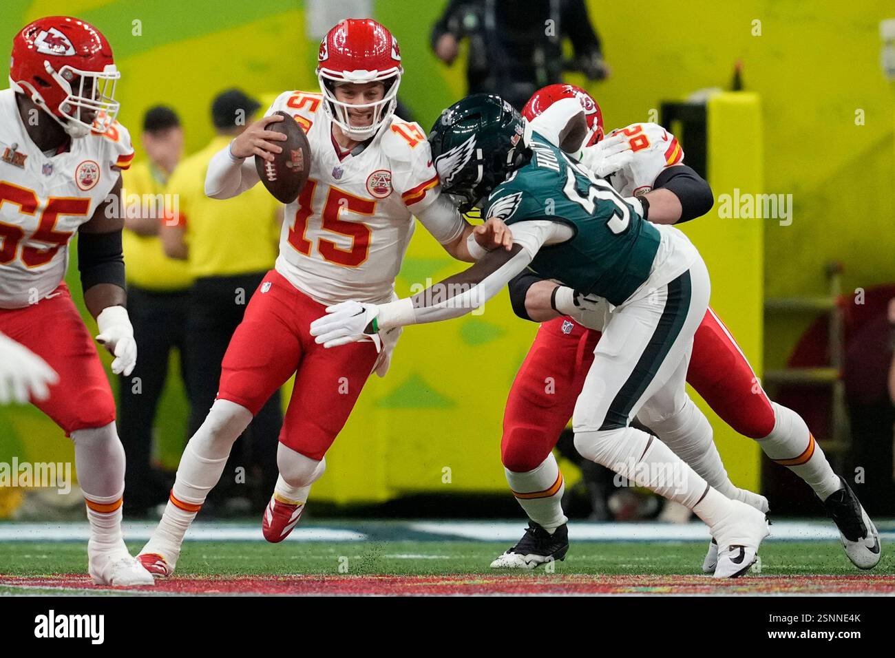 Kansas City Chiefs quarterback Patrick Mahomes (15) is tackled by ...