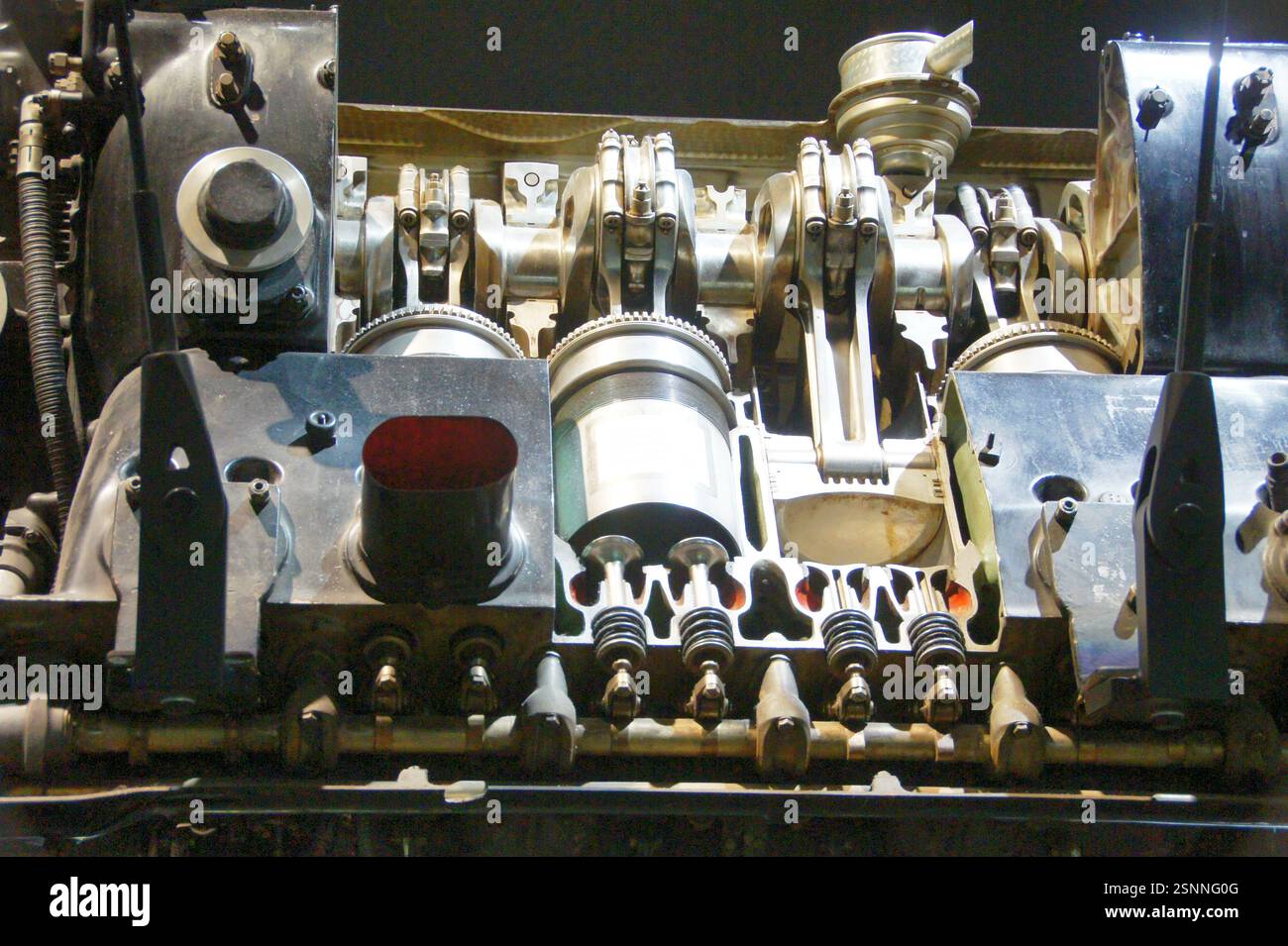 Germany, Munich. An engine cutaway reveals intricate internal ...