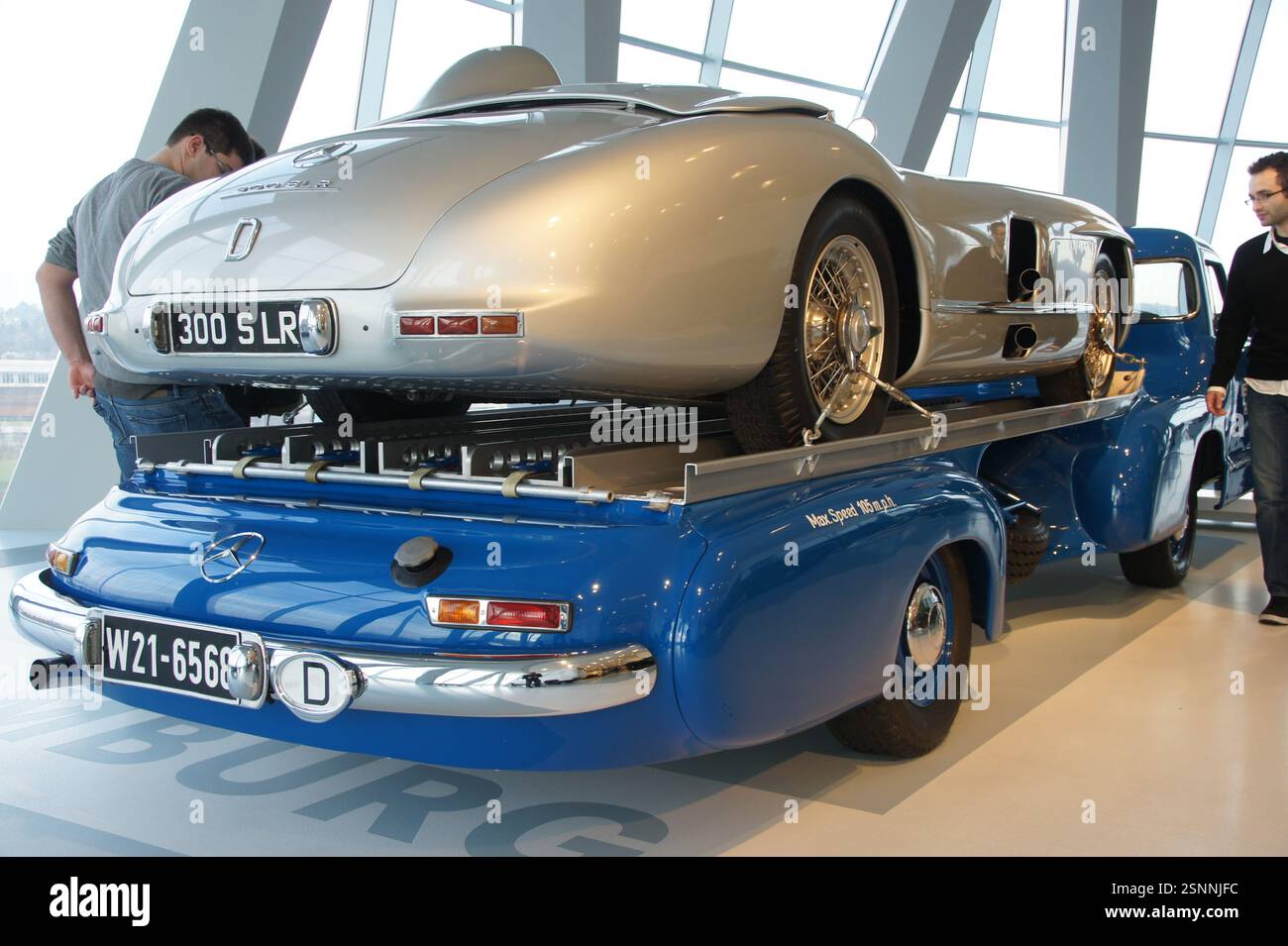 Germany, Munich. The Mercedes-Benz 300 SLR racing car is a sleek silver ...