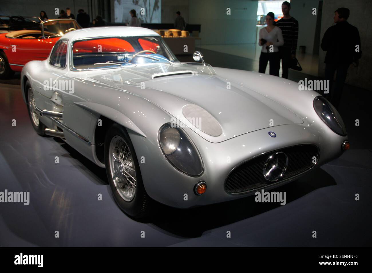 Mercedes-Benz 300 SLR Coupé, a sleek silver race car with gullwing ...