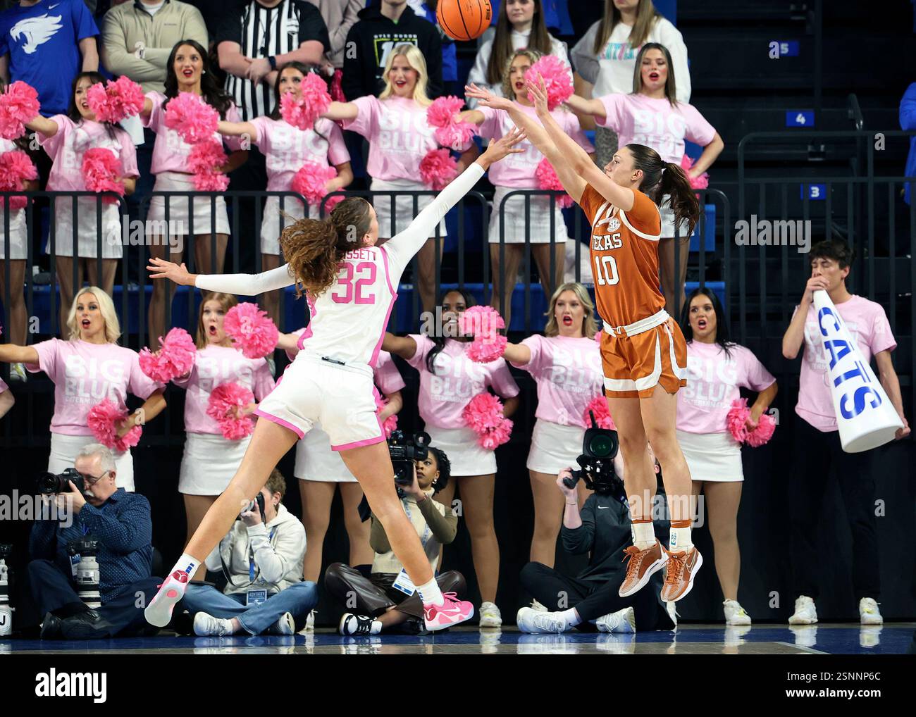 Texas' Shay Holle (10) shoots while pressured by Kentucky's Amelia ...