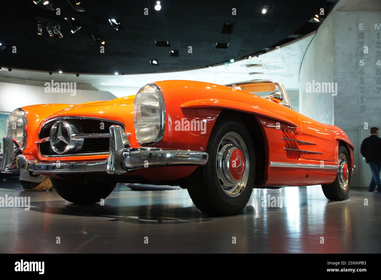 Germany, Munich. Orange Mercedes-Benz 300 SL Roadster with gleaming ...