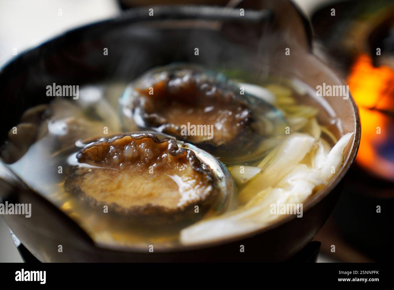 Abalone hot pot Stock Photo - Alamy