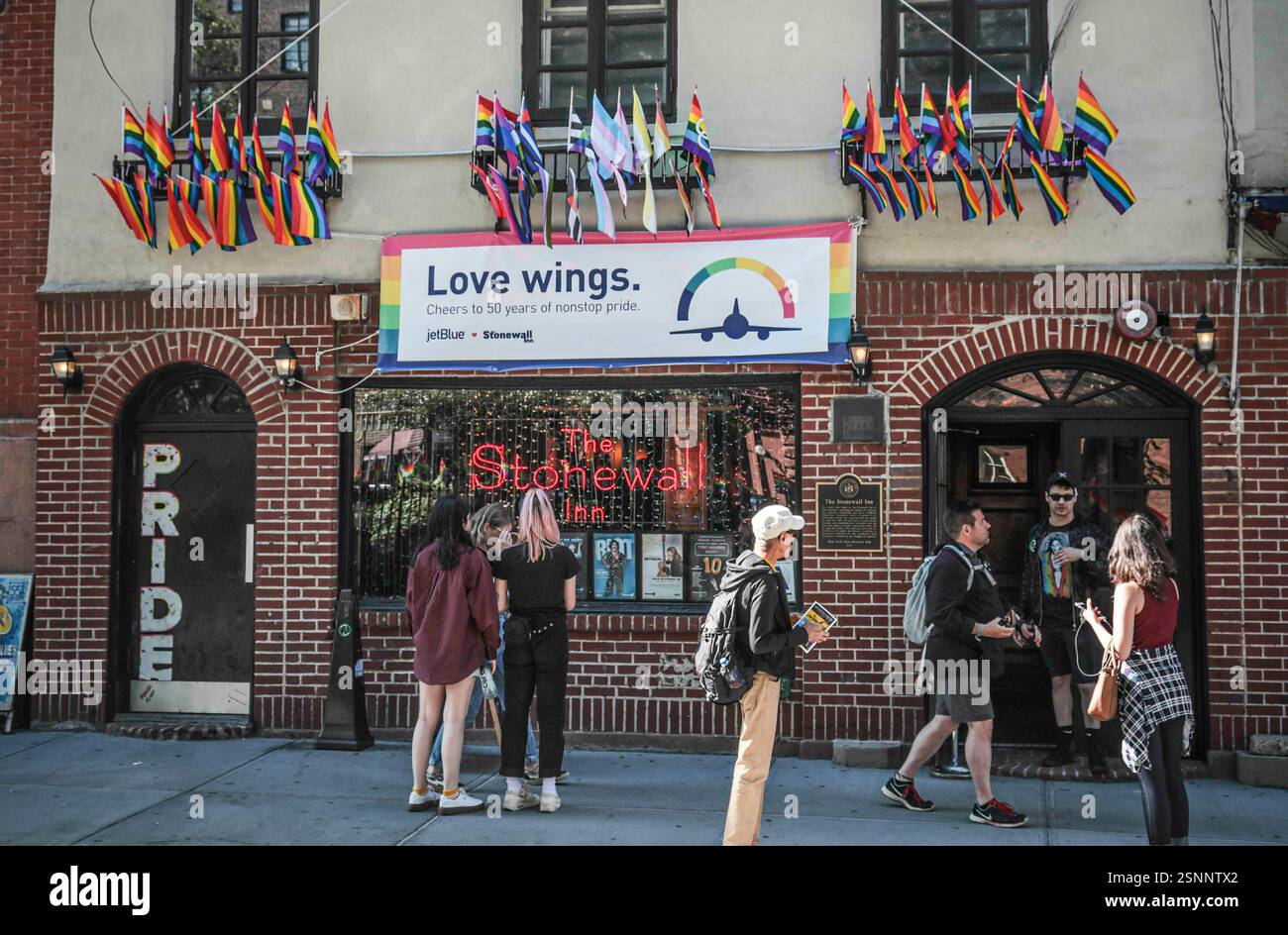 FILE - Pride flags and colors display on the Stonewall Inn bar, marking ...