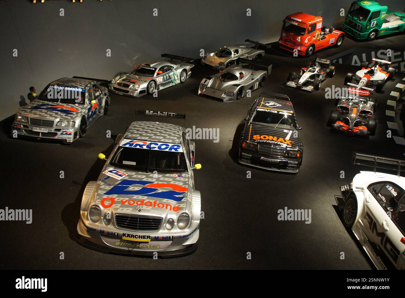 Germany, Munich. The Mercedes-Benz CLK DTM racing cars are on display in a museum, showcasing ...