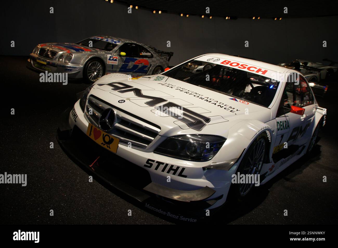 Germany, Munich. A white Mercedes-Benz C-Class DTM race car with sharp ...