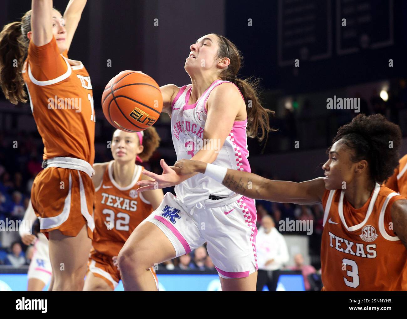 Kentucky's Georgia Amoore, middle, is fouled by Texas' Rori Harmon ...