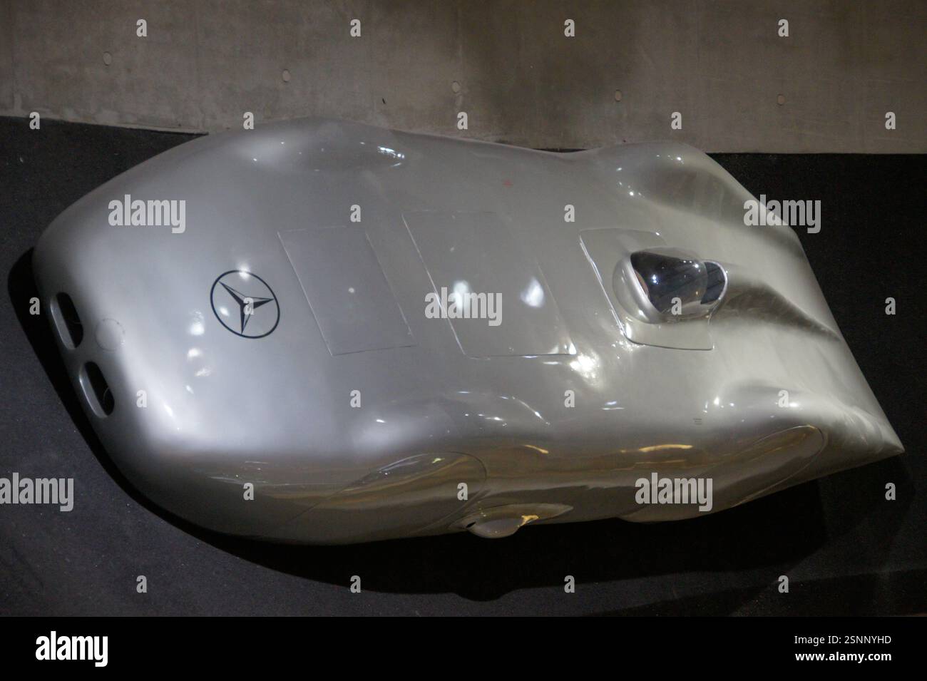 Germany, Munich. A sleek, silver Mercedes-Benz W125 Rekordwagen, a ...