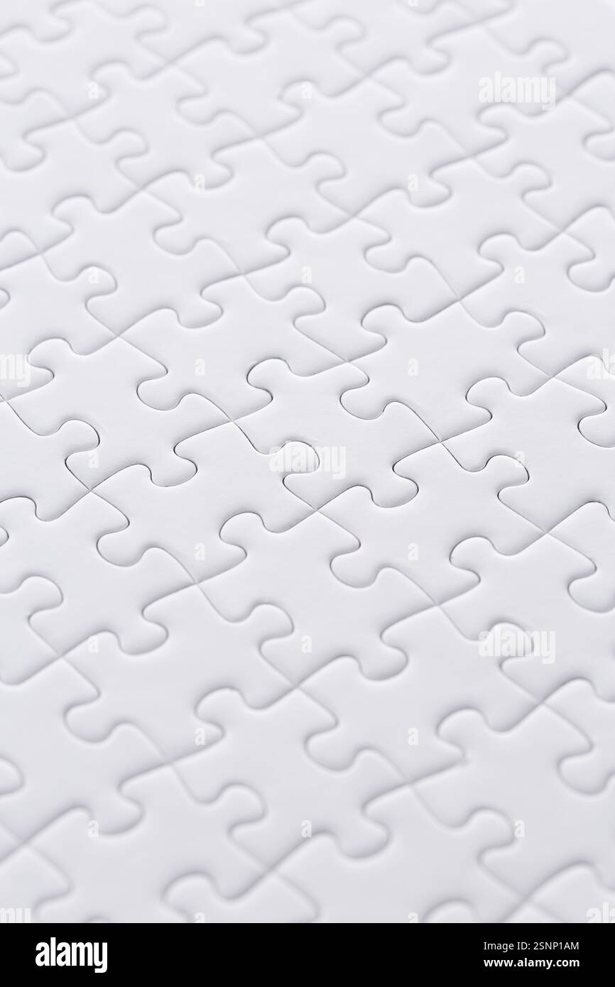 White jigsaw puzzles Stock Photo - Alamy