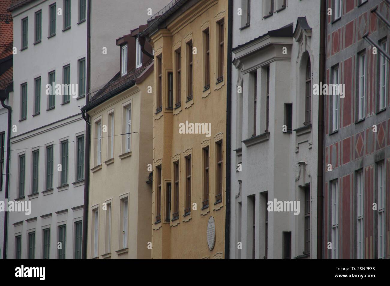 A row of historic buildings in Germany, Munich showcases a vibrant mix ...