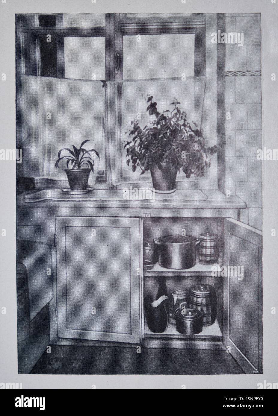 A retro, vintage Soviet kitchen cabinet. A black and white photograph ...