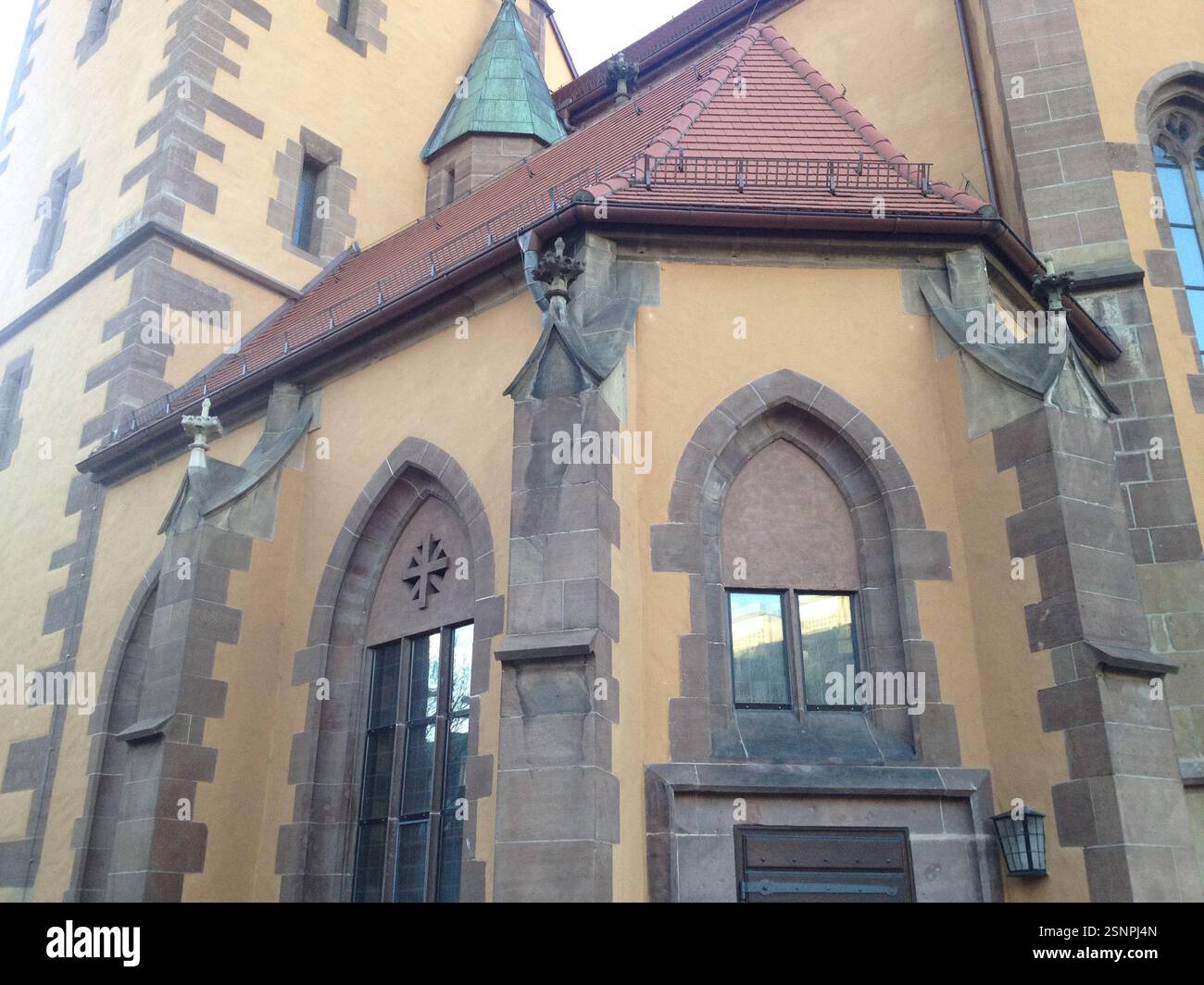 St. Cyriakus Church, Munich, Germany. Brick facade adorned with arched ...