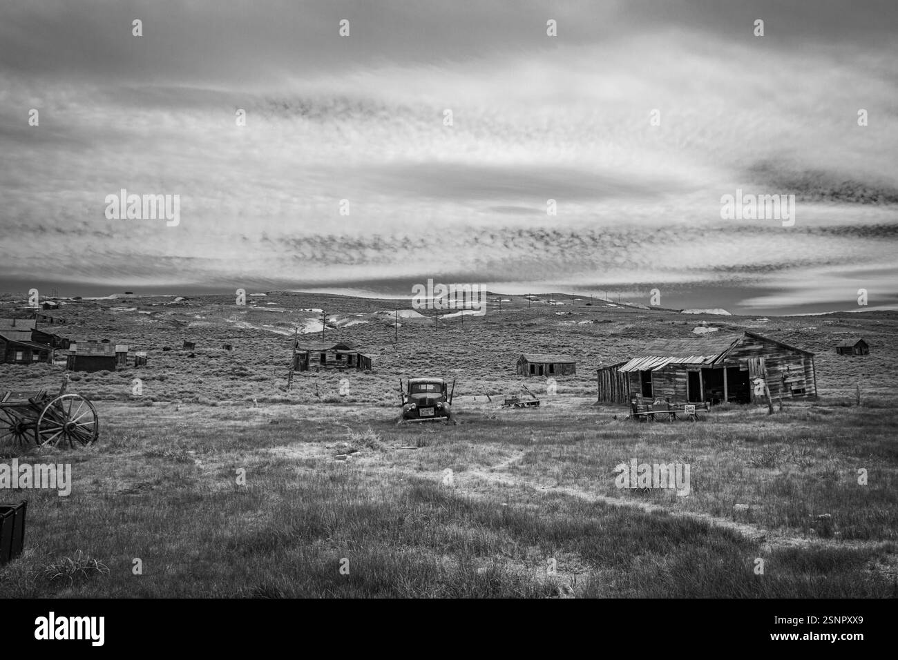 The desolate landscape of Bodie Ghost Town. Abandoned buildings and old ...