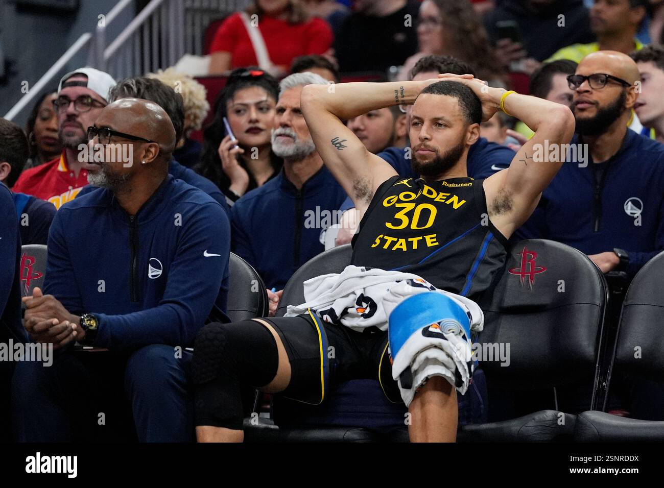 Golden State Warriors' Stephen Curry (30) sits on the bench during the ...