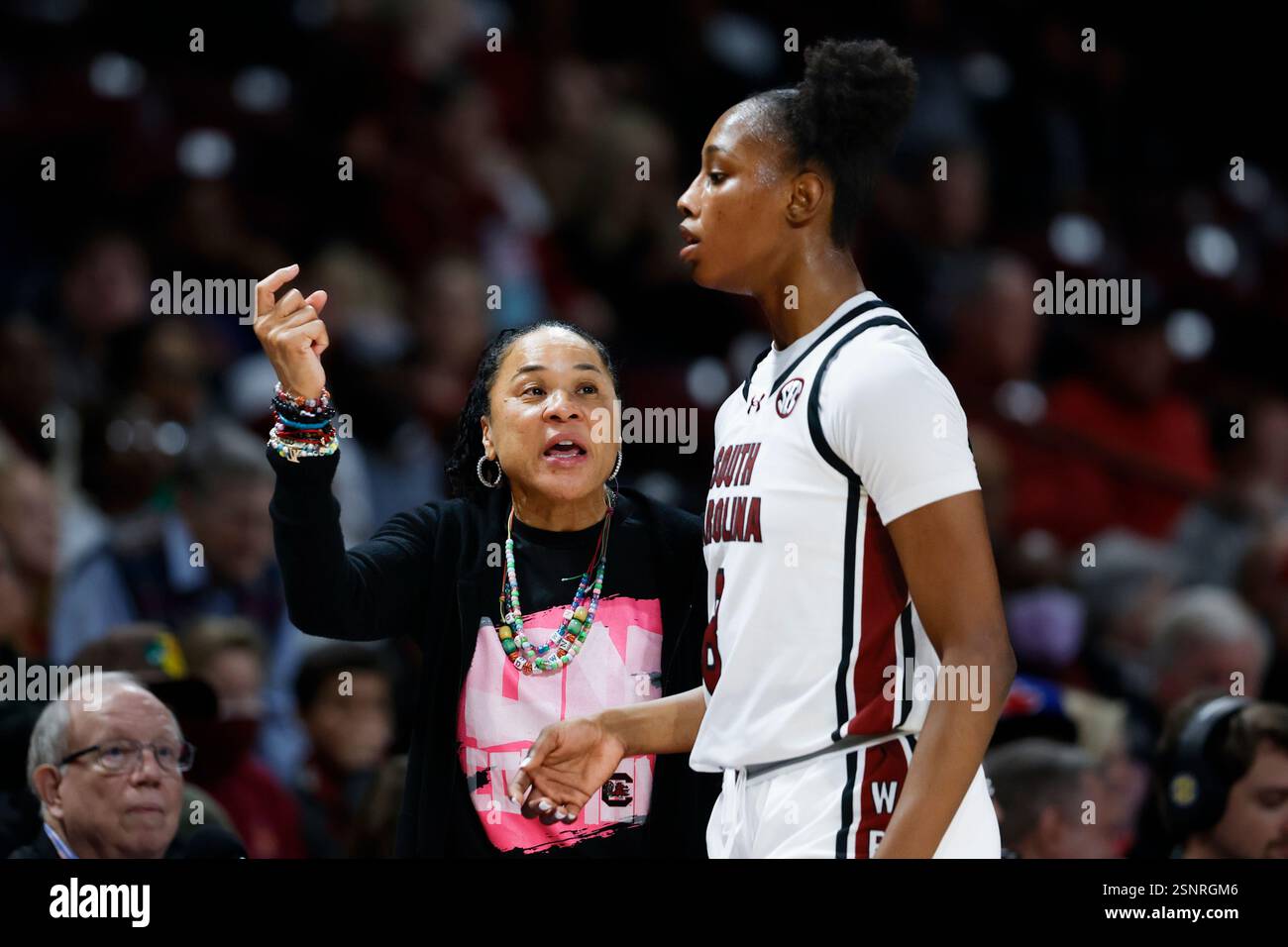 South Carolina head coach Dawn Staley, left, talks to forward Joyce Edwards during the second ...