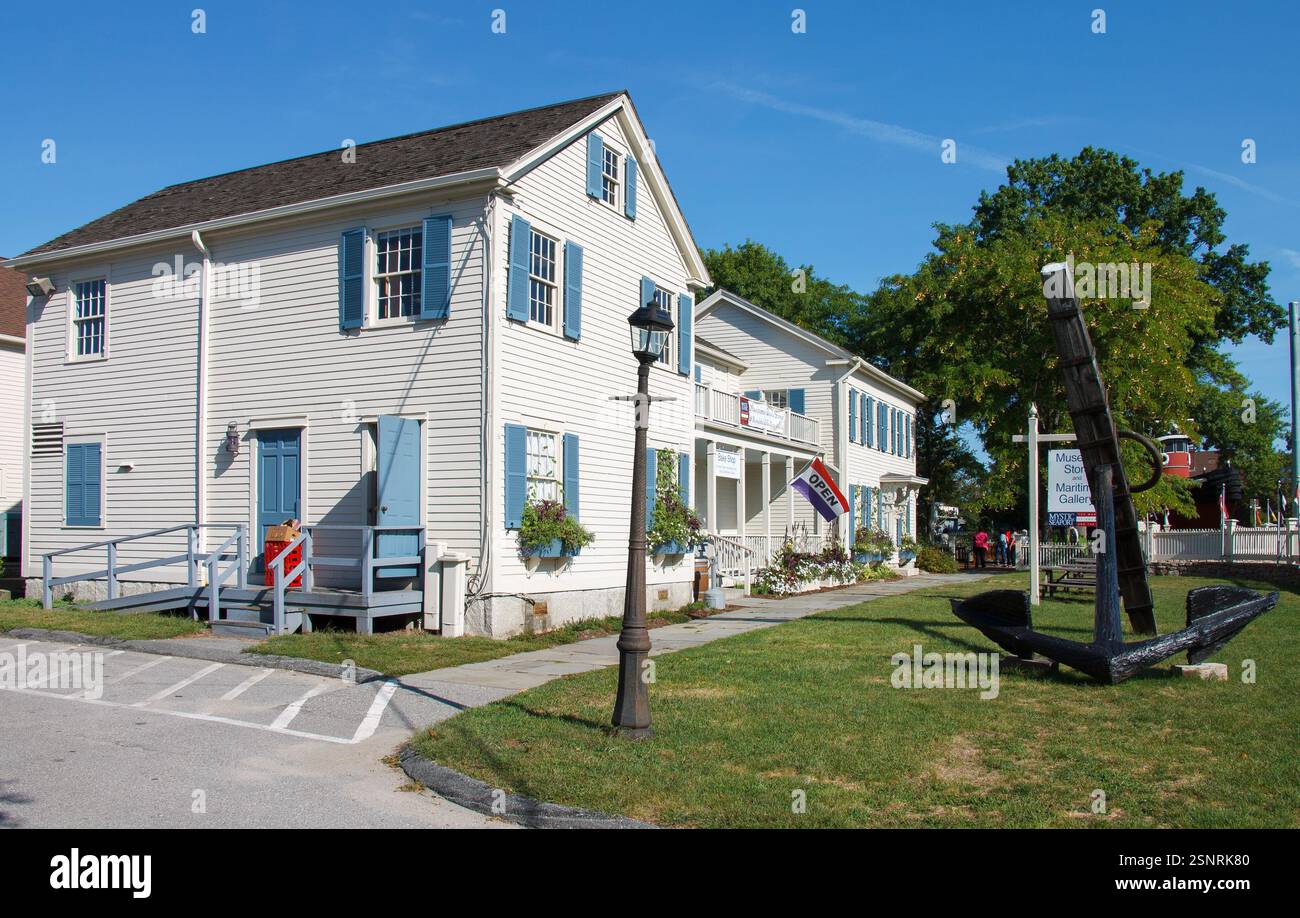 The Mystic Seaport museum historic wood house and a boat anchor ...