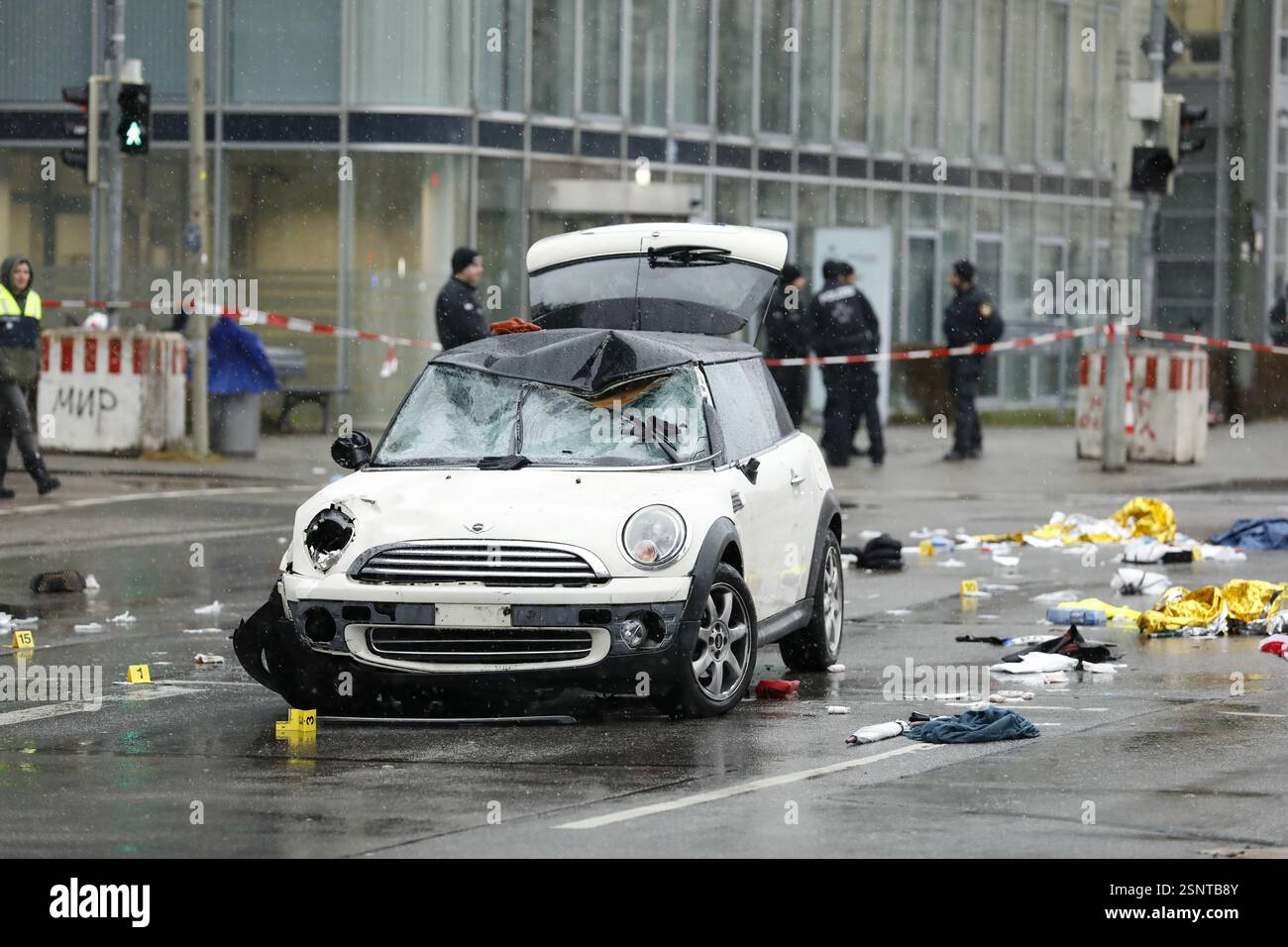 Beijing, Germany. 13th Feb, 2025. A damaged car is pictured at the site ...