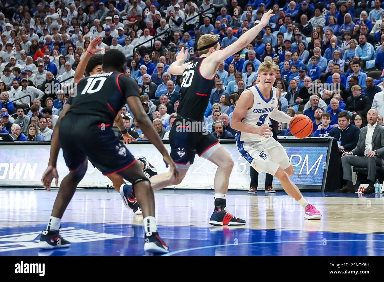 Omaha, NE. U.S. 11th Feb, 2025. - Creighton Bluejays guard Ty Davis (9) drives to the basket as ...