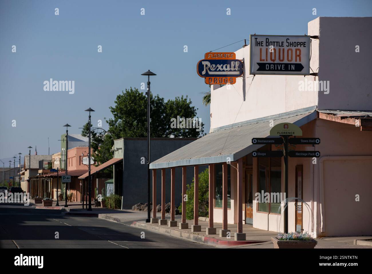 Florence, Arizona, USA - May 31, 2022: Downtown businesses stand on ...