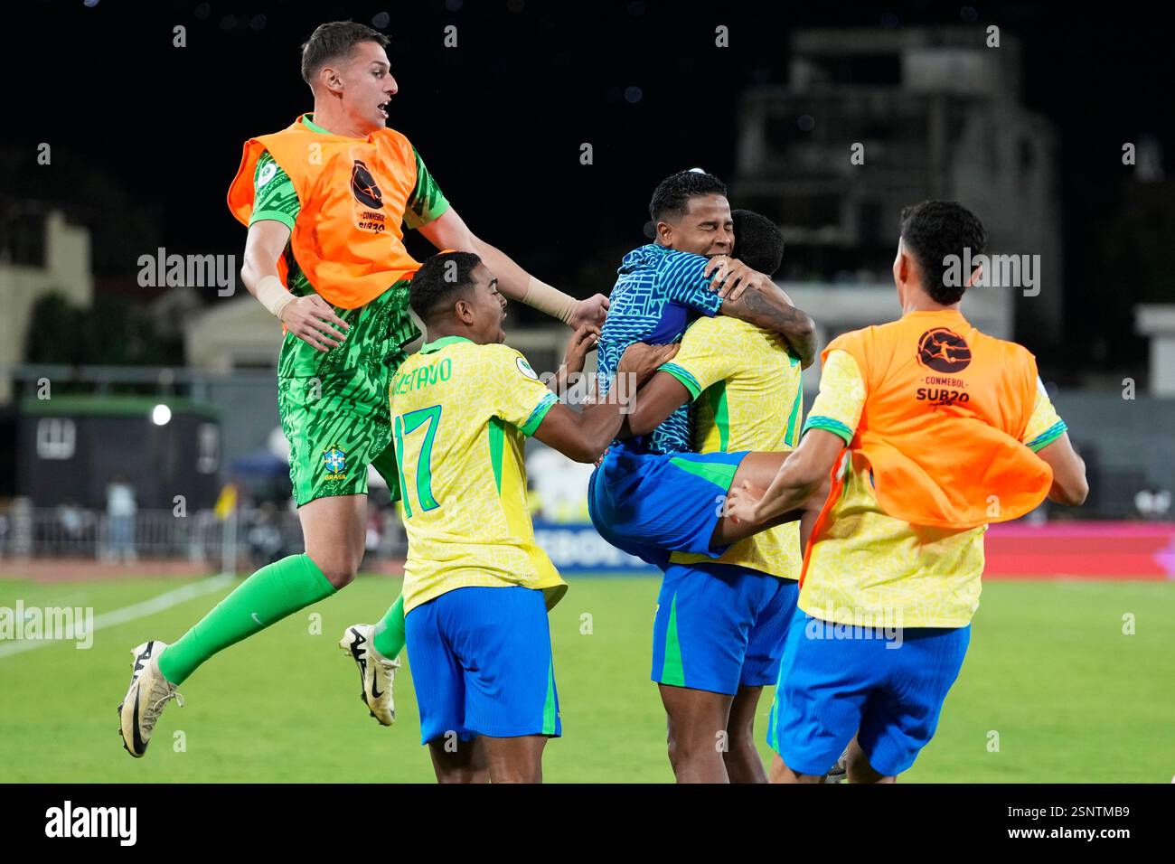 Teammates celebrate with Brazil's Rayan after he scored his side's ...