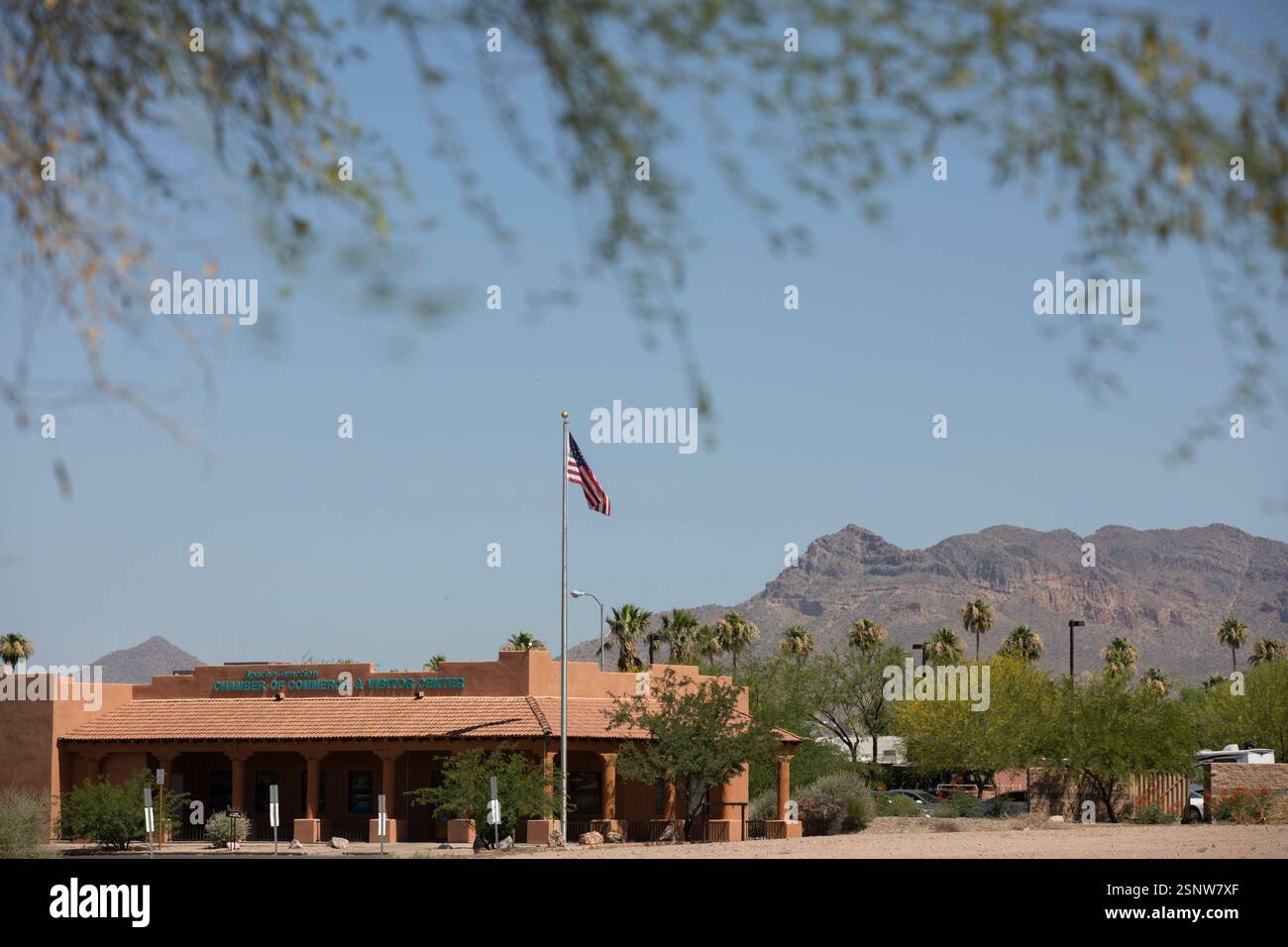 Apache Junction, Arizona, USA - June 1, 2022: Businesses stand in a ...