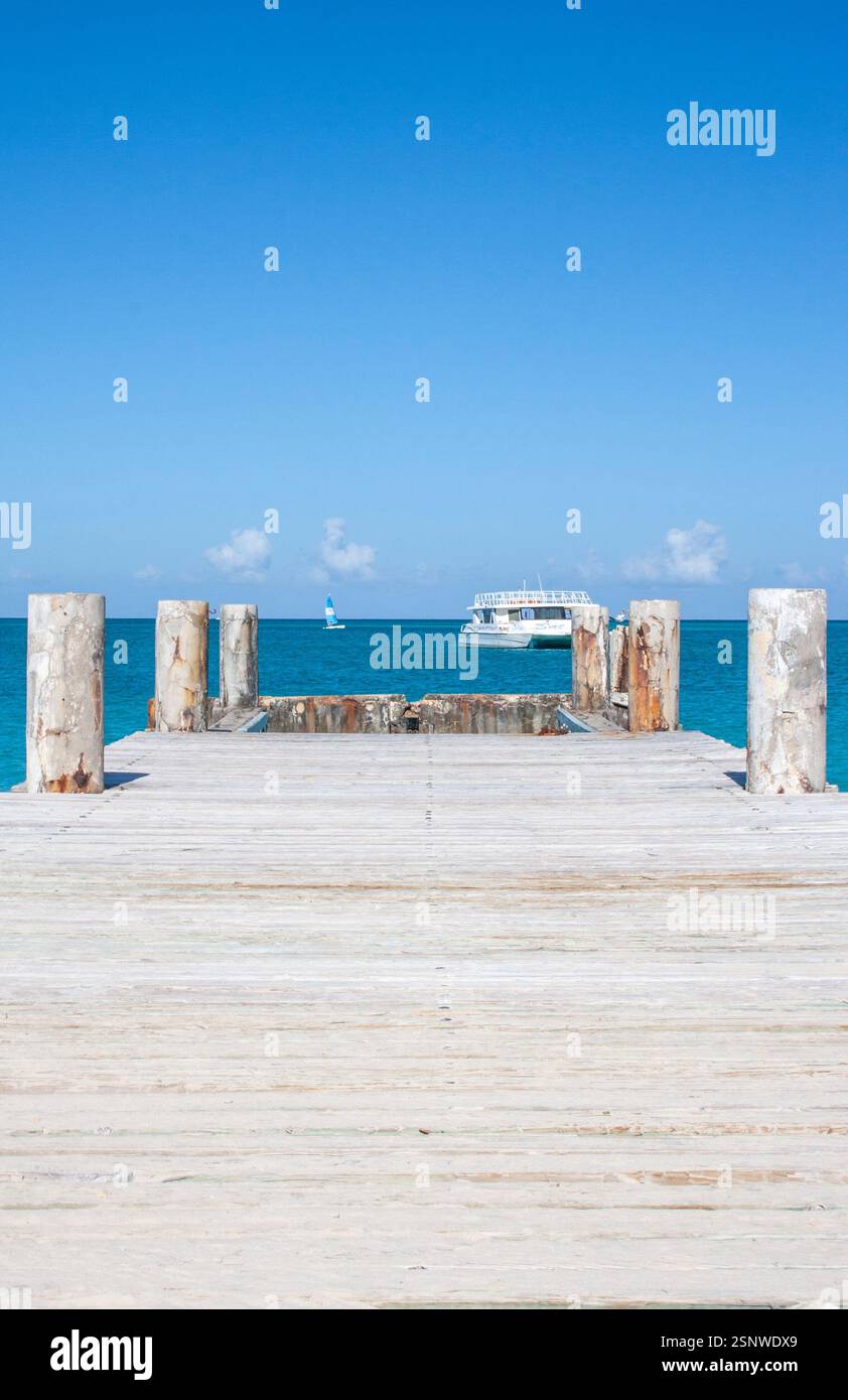 A view of the Atlantic Ocean from a dock on Grace Bay beach in Turks ...
