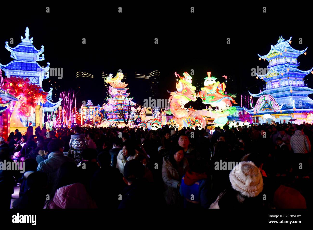Chengdu,China.12th February 2025. Lanterns illuminate the night sky ...