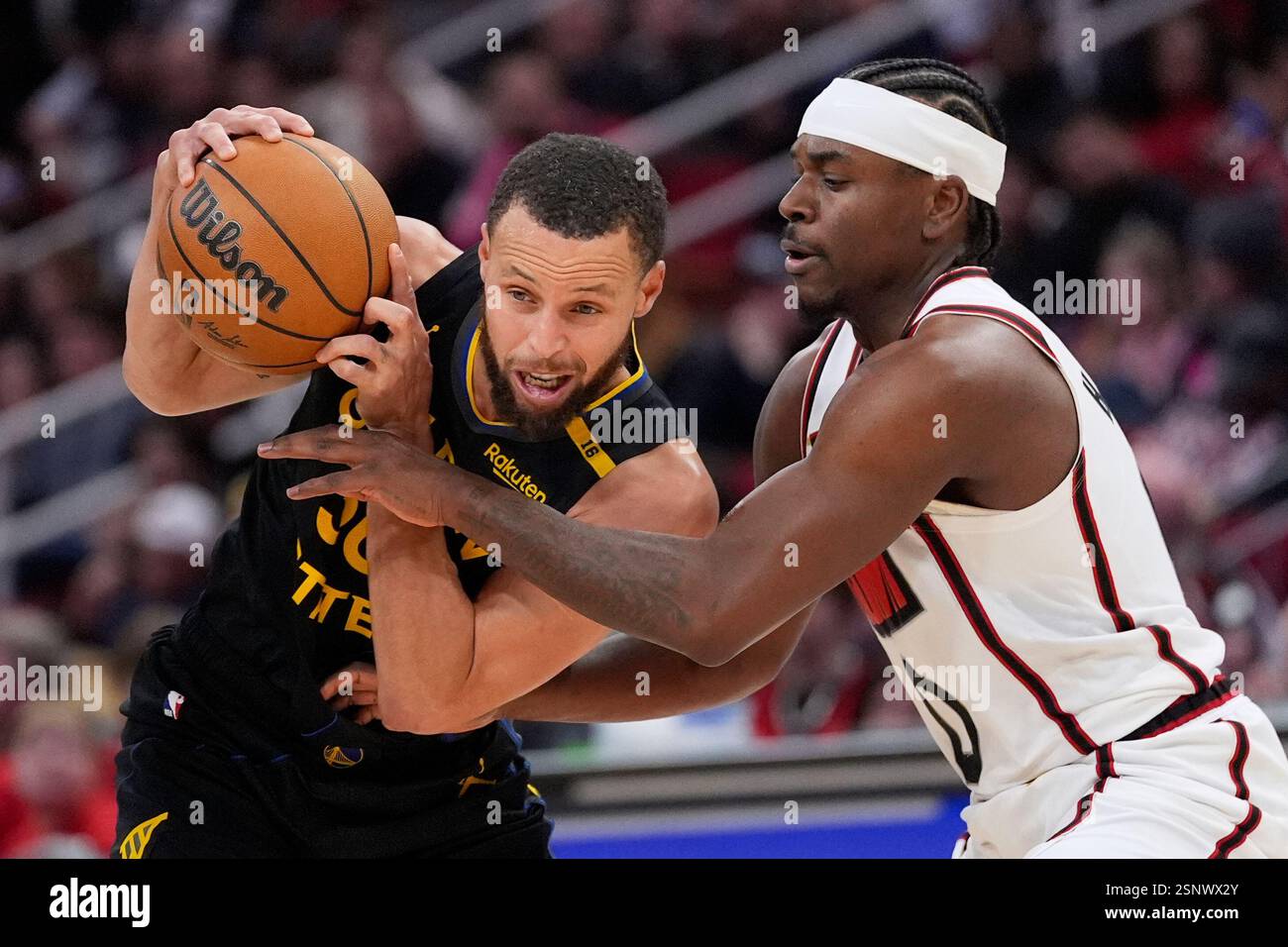 Houston Rockets' Aaron Holiday (0) defends against Golden State ...