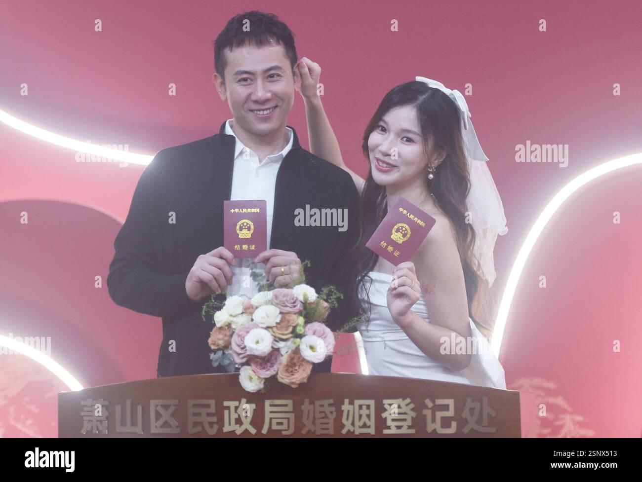 HANGZHOU, CHINA - FEBRUARY 14, 2025 - Couples pose for photos at the ...