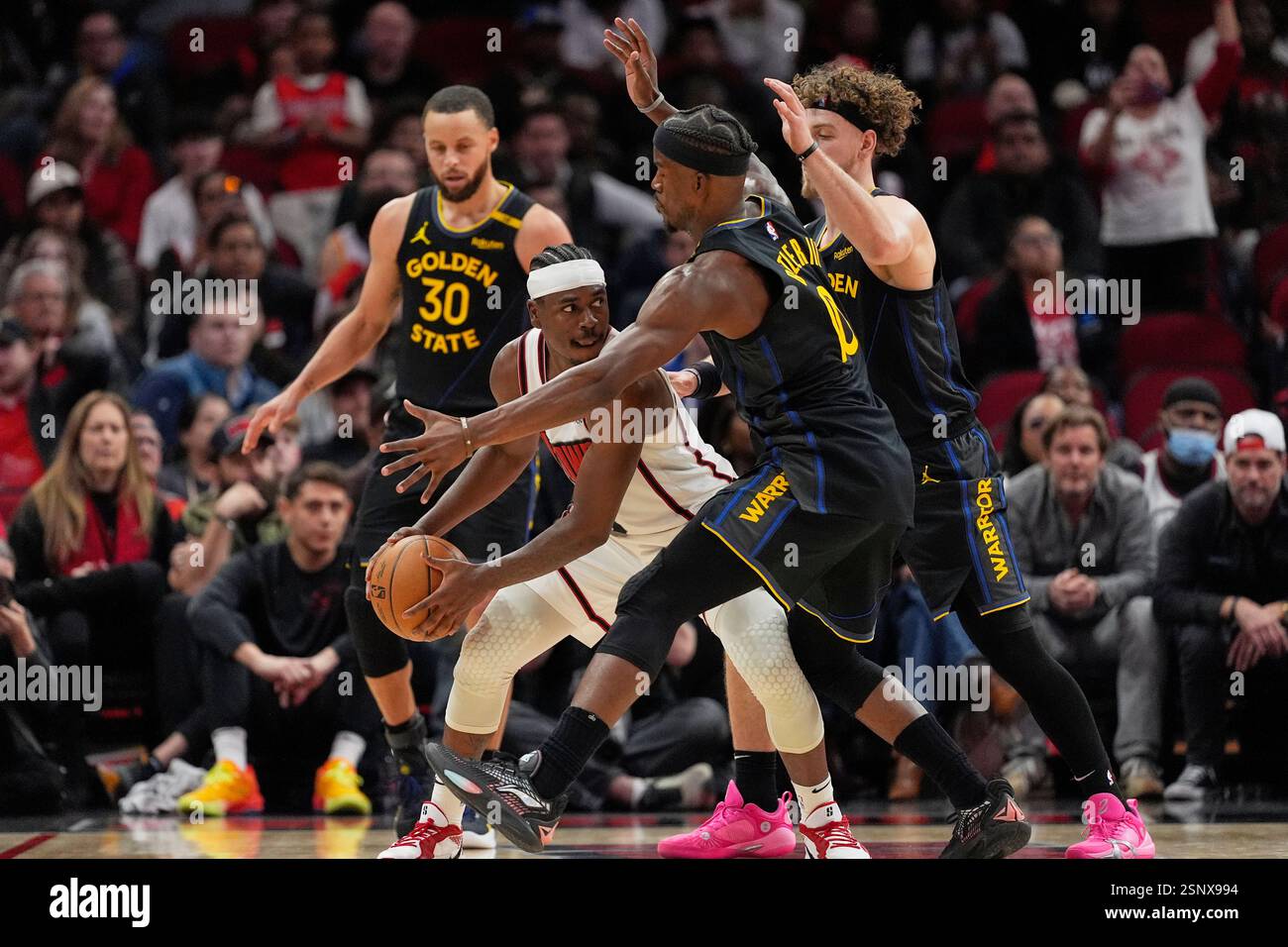 Golden State Warriors' Jimmy Butler (10) and Brandin Podziemski, right ...