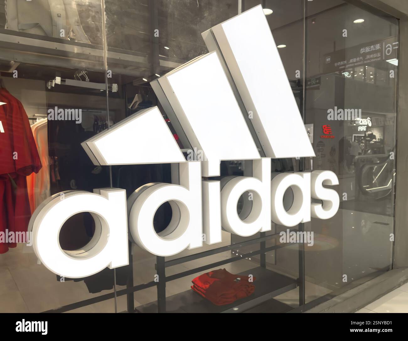 Guangzhou, China, March 11, 2024: The banner of Adidas company above ...