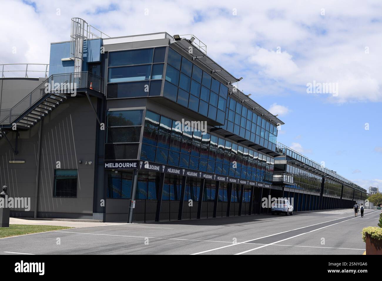 The deserted pit lane and glass buildings of the Albert Park Formula 1 ...