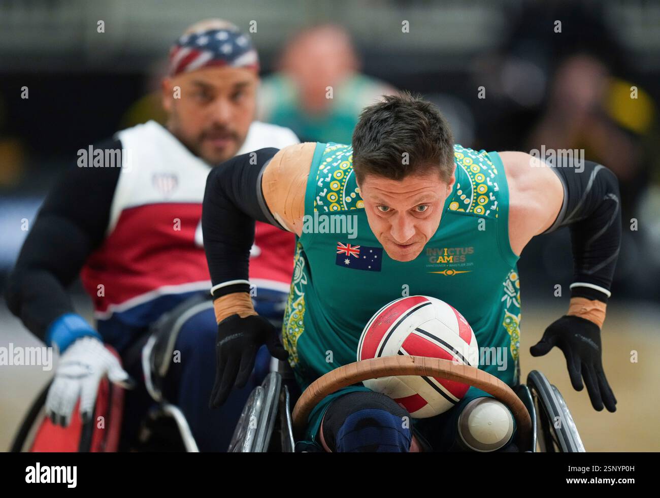 Australia's David Miln carries the ball while playing the U.S. during ...