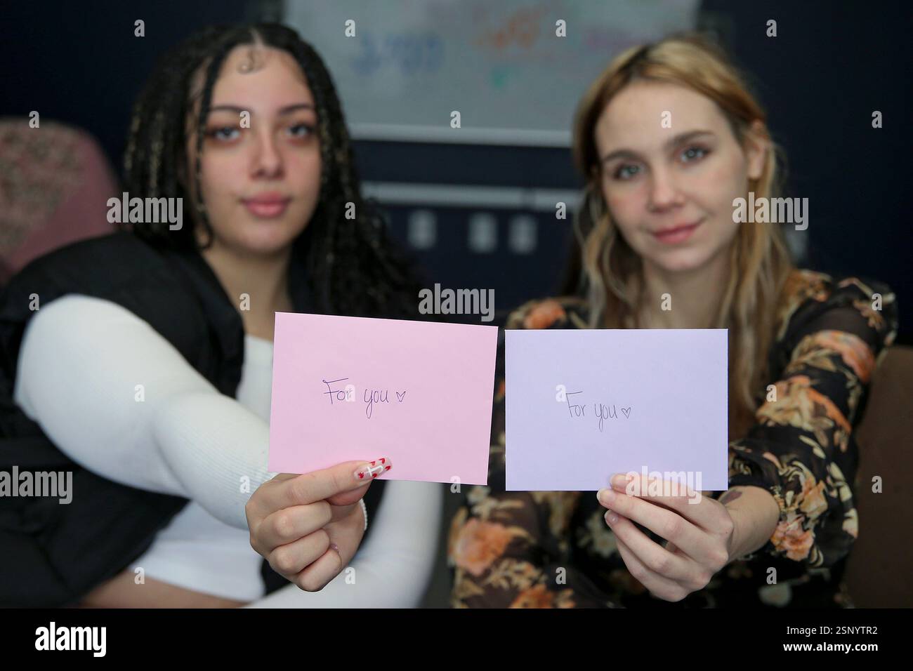 Ireland Daugherty, right, and intern Elizabeth Higgins hold letters ...